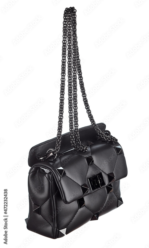 Handbag made of genuine leather in black color, decorated with chains and rivets in the shape of ...