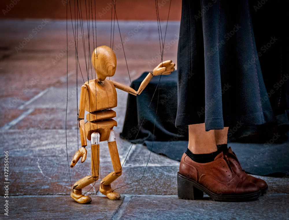 Psychological concept of control, manipulation or addiction. Marionette ...