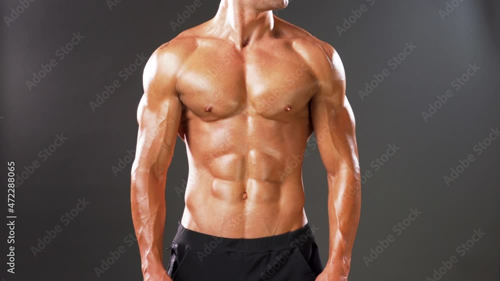 Shirtless Muscular Man Bouncing & Flexing His Pecs Stock Video | Adobe ...