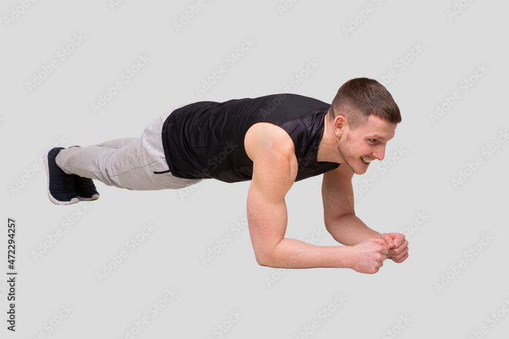 Sport man Standing in Plank on Elbows. Sportsman Plank Exercise Stock ...
