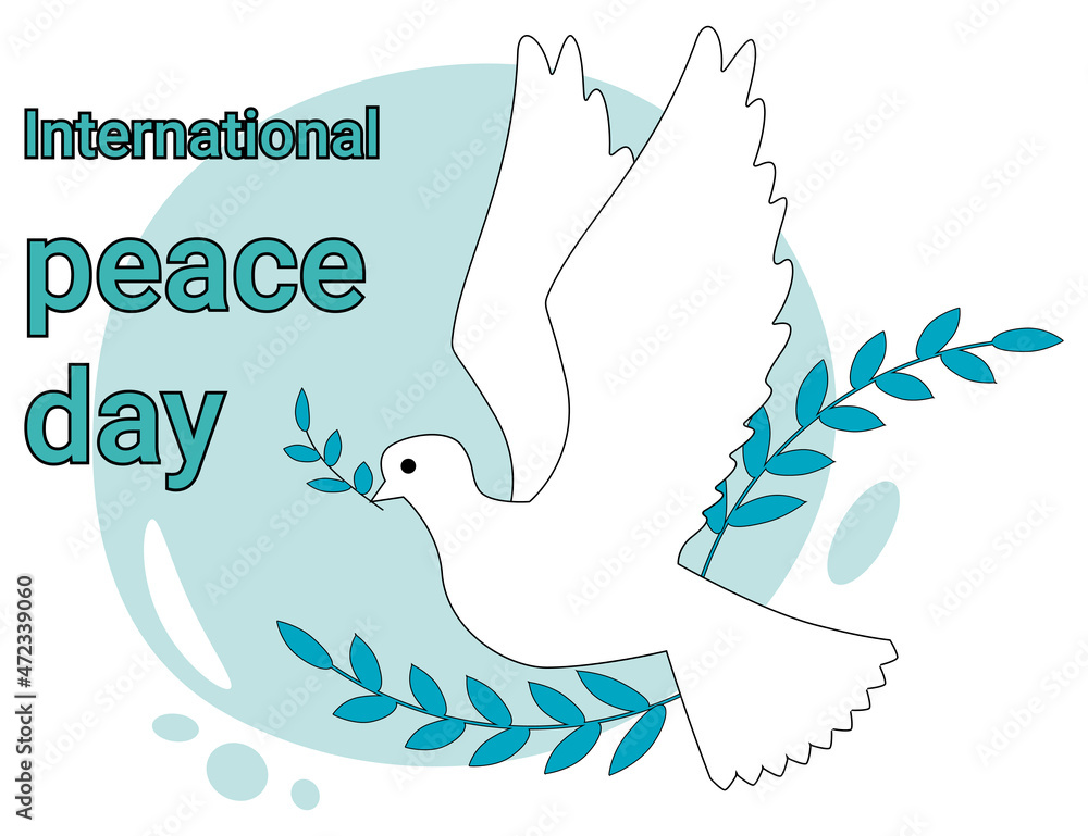 International Day of Peace.A flying pigeon with a twig as a symbol of ...