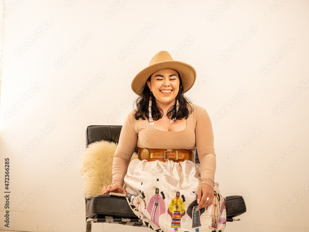 Young Indigenous female model indoors Stock Photo | Adobe Stock
