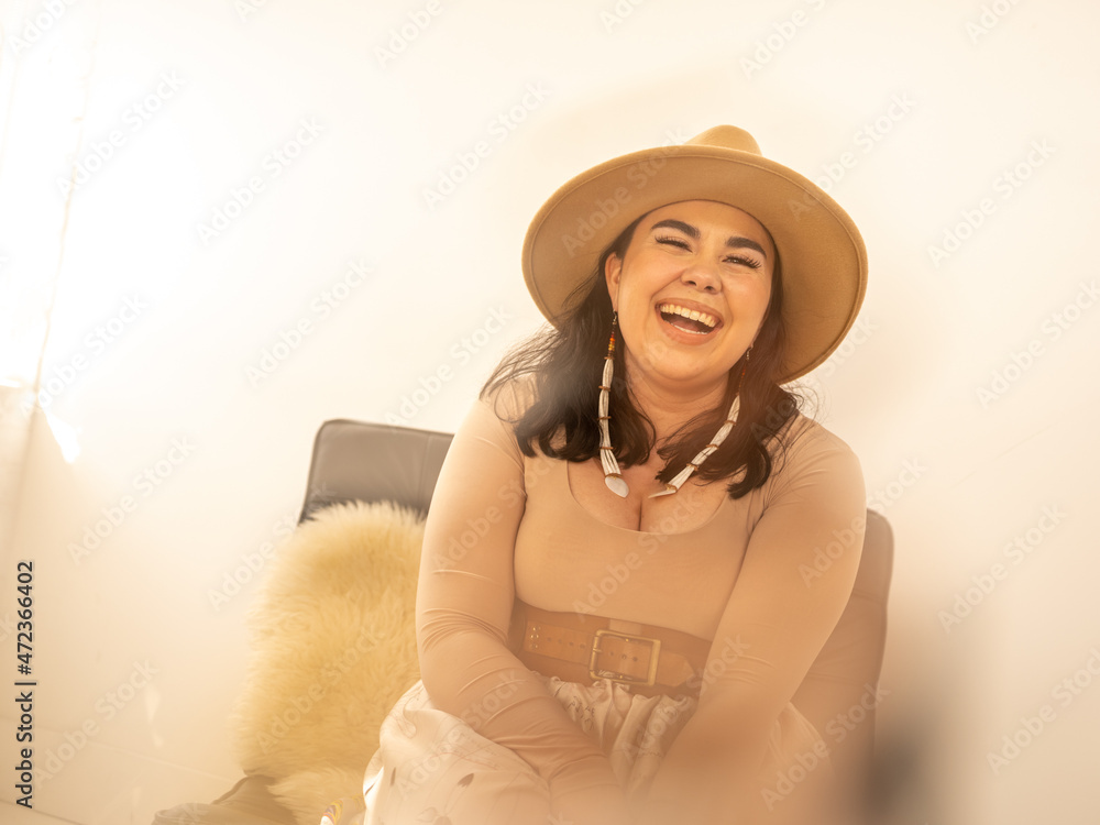 Young Indigenous female model indoors Stock Photo | Adobe Stock