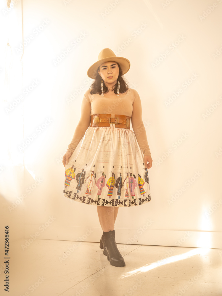 Young Indigenous female model indoors Stock Photo | Adobe Stock