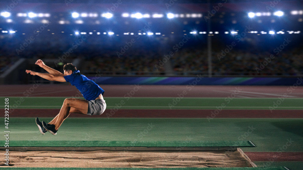 Long Jump Championship: Professional Male Athlete Jumping on Long ...