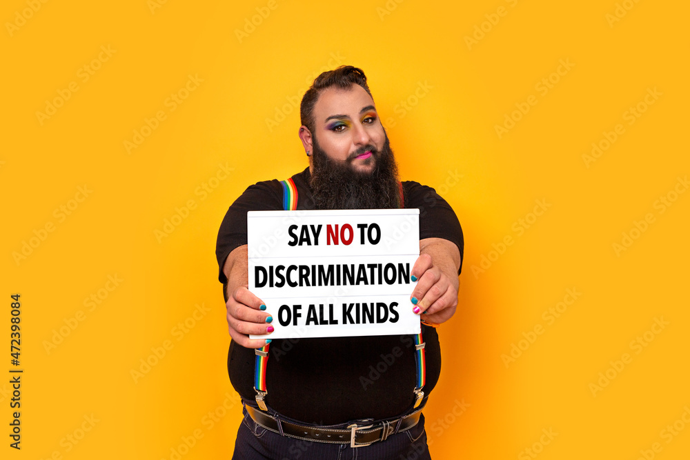 Big bearded gay man with a lightbox and "say no to discrimination ...