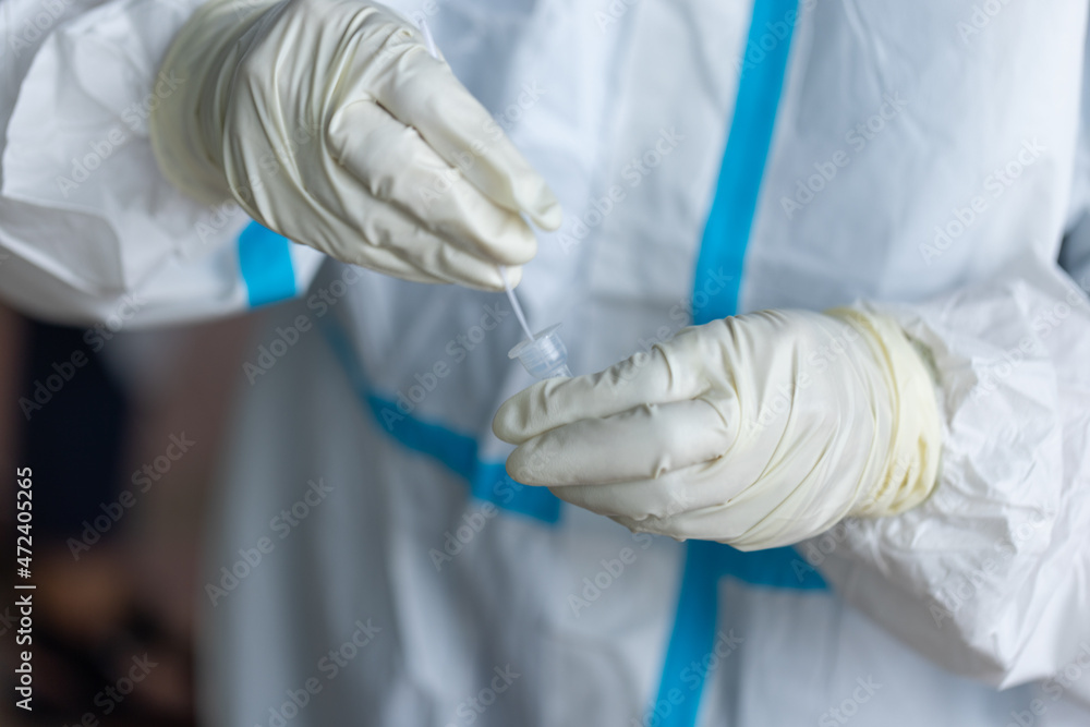 The doctor with PPE suit, Doctor is using a test coronavirus(covid-19 ...