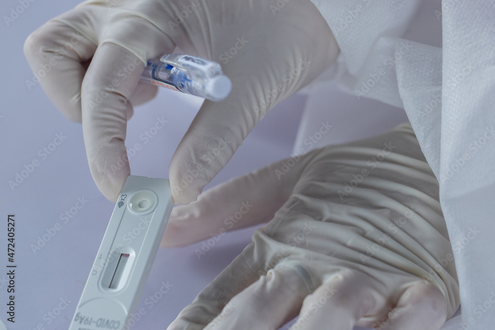 The doctor with PPE suit, Doctor is using a test coronavirus(covid-19 ...