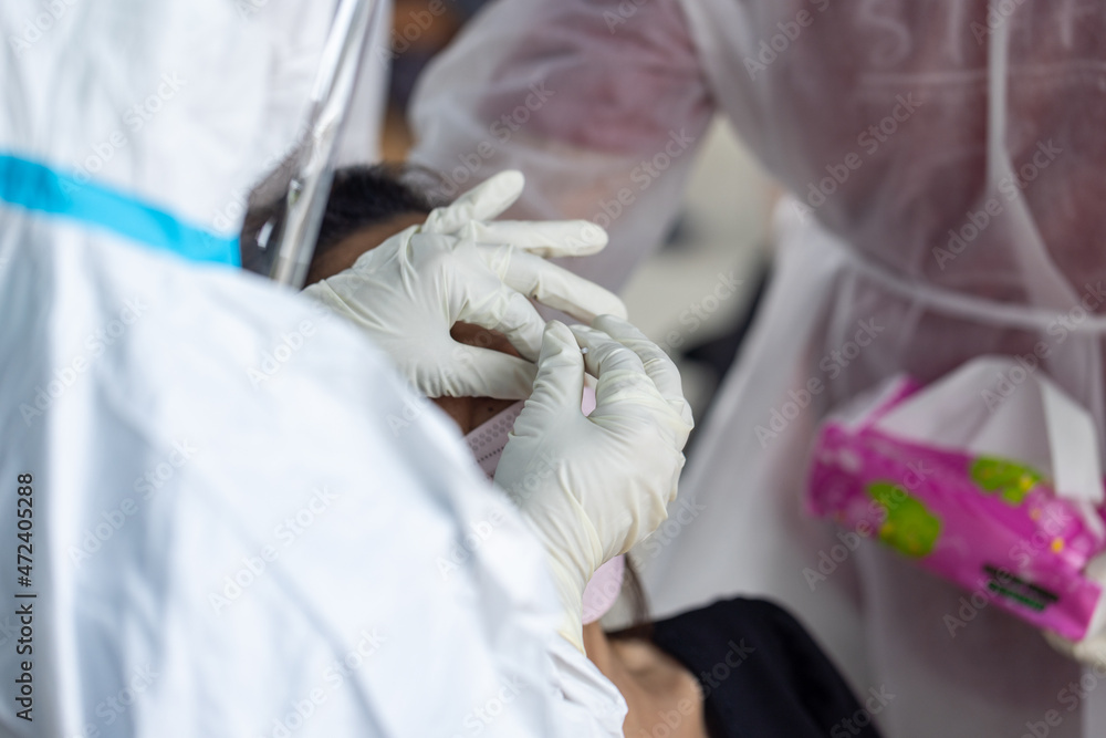 The doctor with PPE suit, Doctor is using a test coronavirus(covid-19 ...
