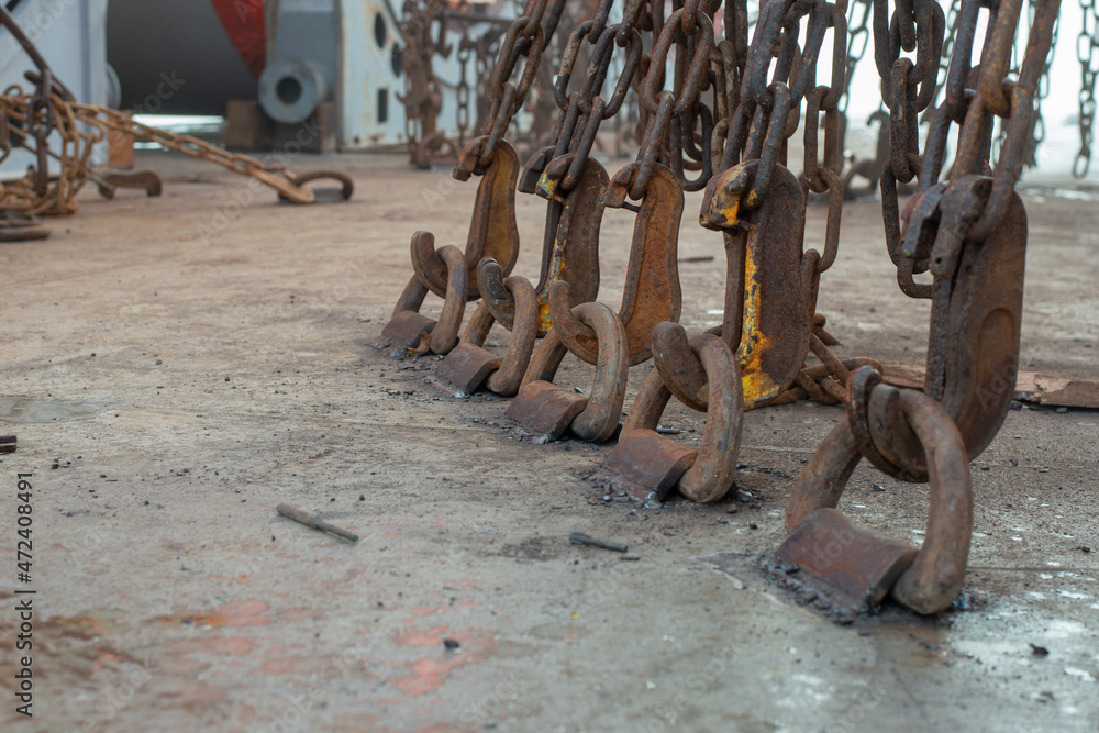 Safe cargo lashing onboard of ship deck with cargo lashing chains and ...