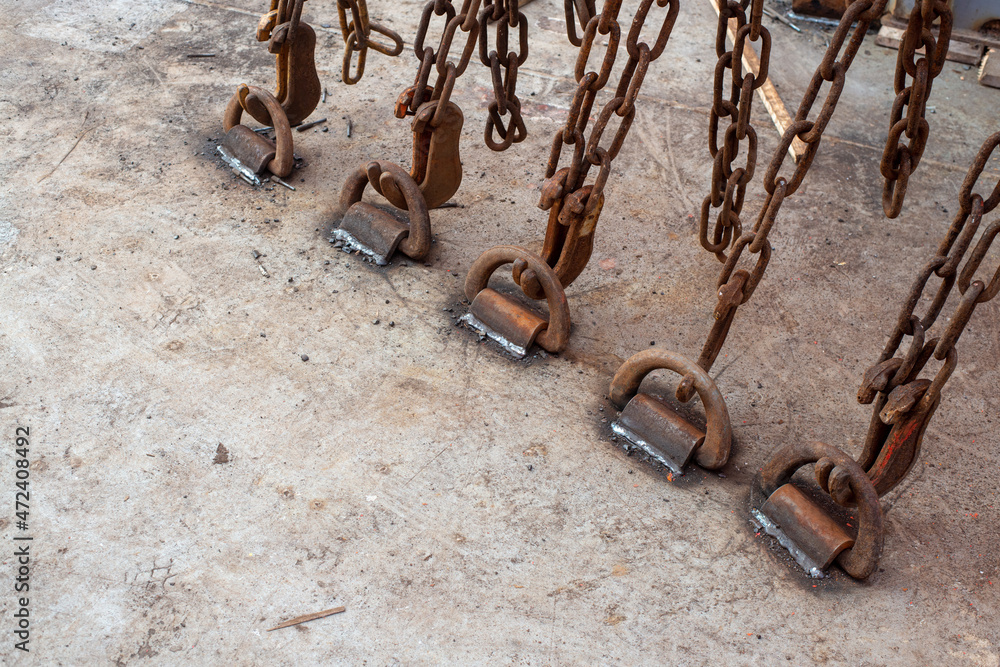 Safe cargo lashing onboard of ship deck with cargo lashing chains and ...