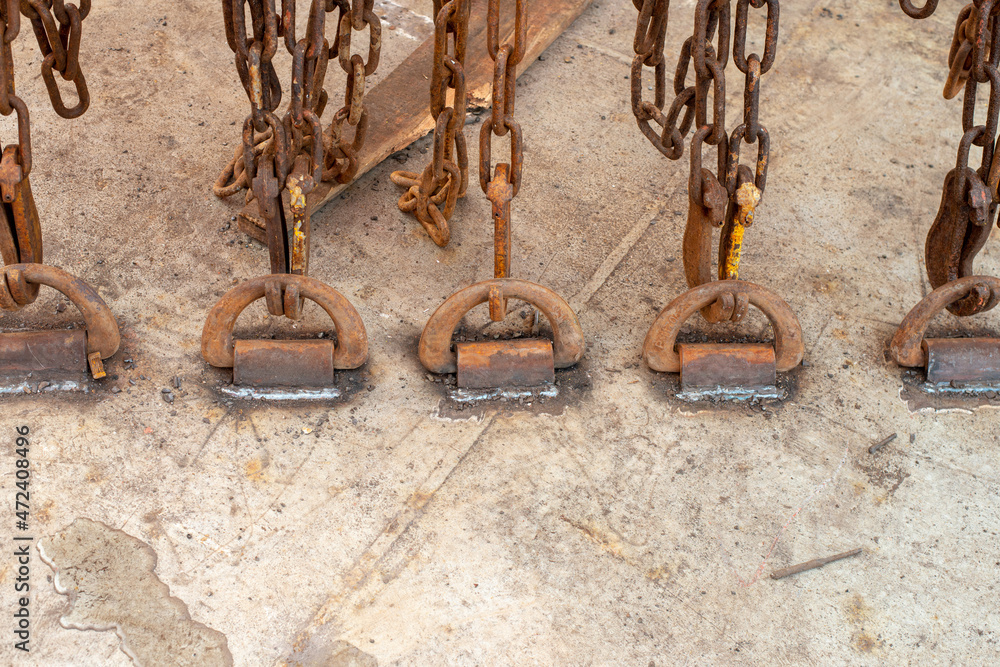Safe cargo lashing onboard of ship deck with cargo lashing chains and ...