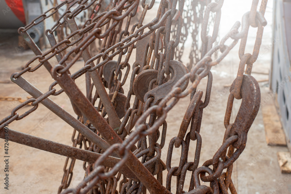 Safe cargo lashing onboard of ship deck with cargo lashing chains and ...