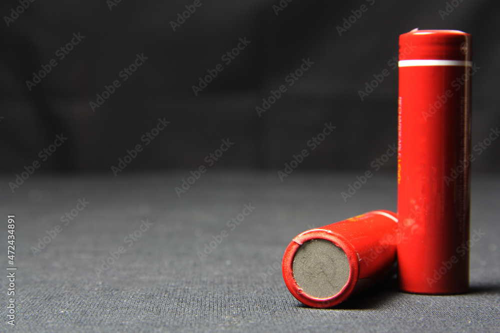 Lithium-ion batteries. The battery is red. Energy charge Stock Photo ...