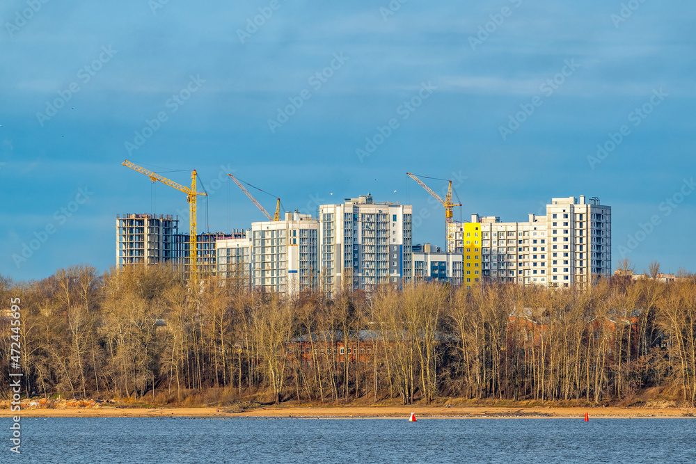 Construction cranes and construction of a new multi-storey residential ...