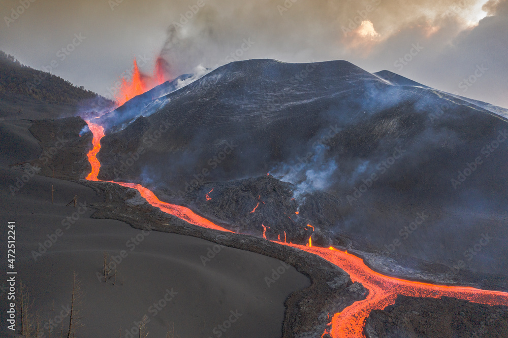Aerial top down view of lava floating down the Volcan Cumbre Vieja, a ...