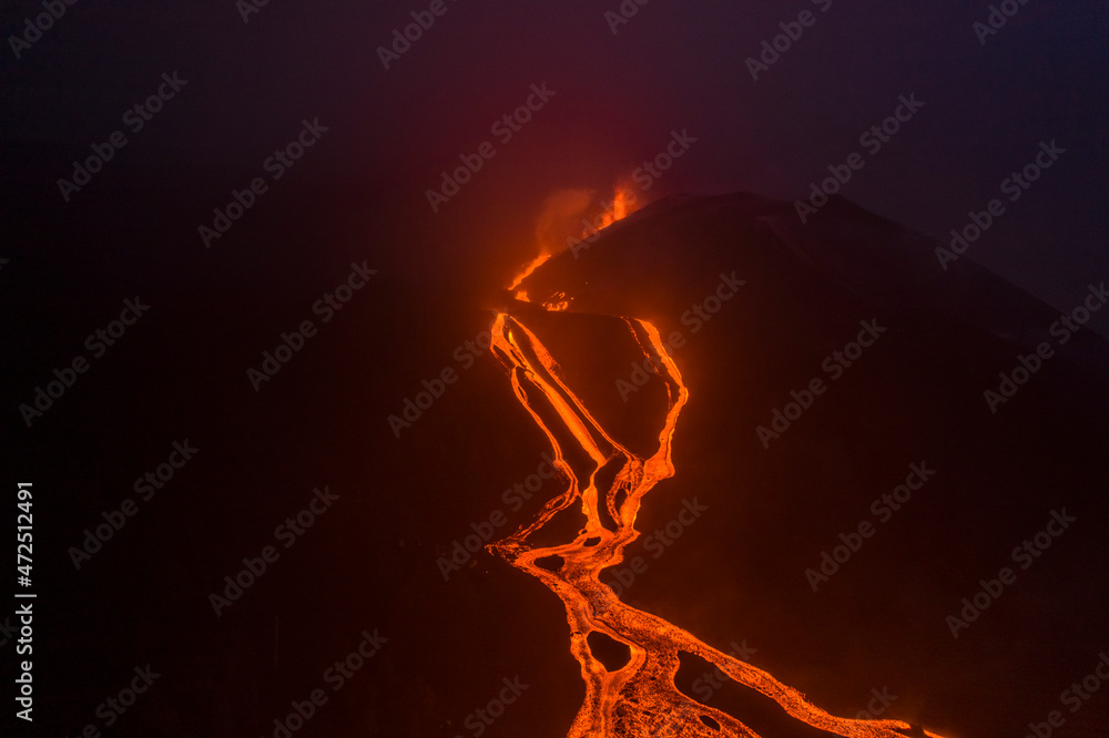 Aerial top down view of lava floating down the Volcan Cumbre Vieja at ...