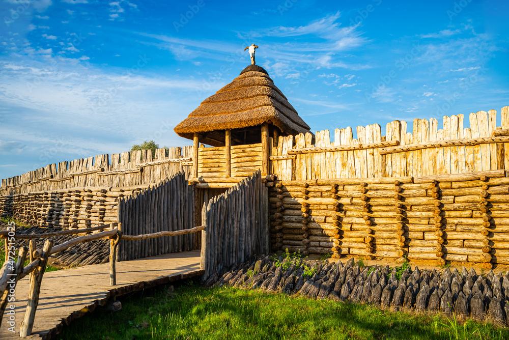 Biskupin, Poland - August 09, 2021. Archaeological site and a life-size ...