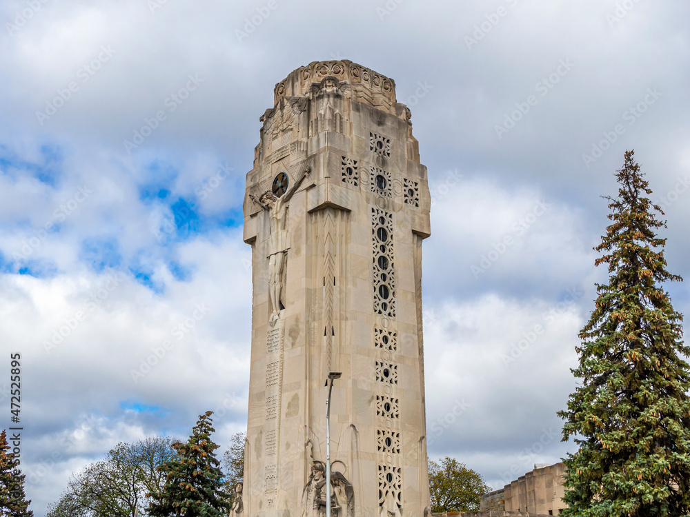 Jesus carved in the side of a tower Stock Photo | Adobe Stock