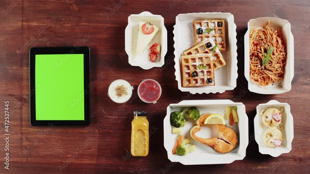 Food delivery app, take away meals in disposable containers on wooden ...