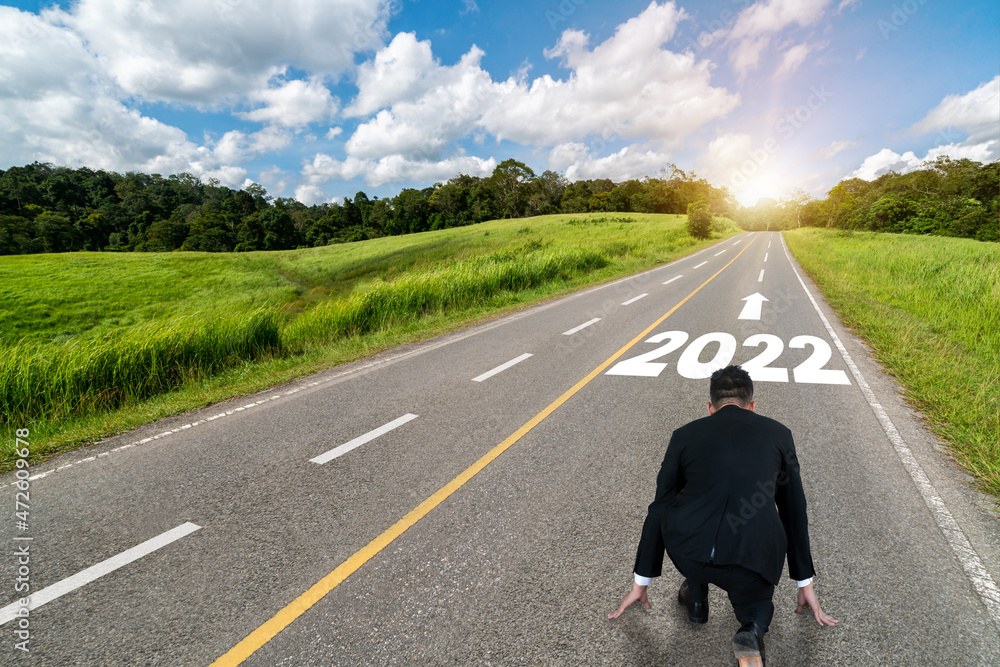 The 2022 New Year journey and future vision concept . Businessman ...