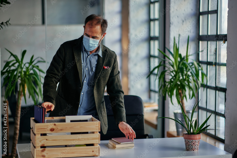 Taking stuff out of box for setting up office table Stock Photo | Adobe ...