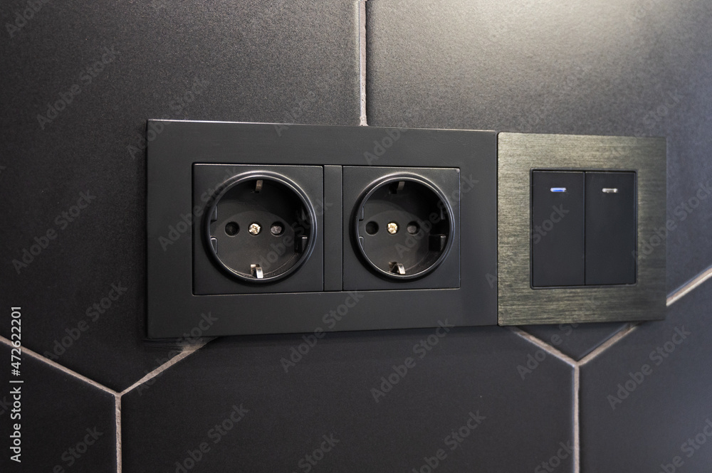 Double black socket Stock-Foto | Adobe Stock