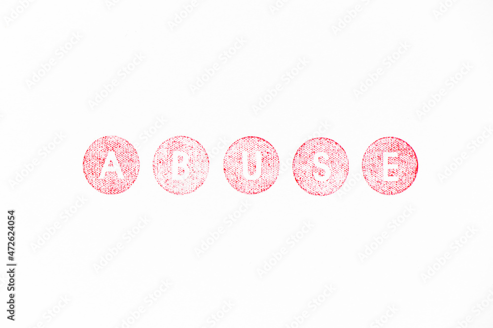Red color rubber stamp in word abuse on white paper background Stock ...
