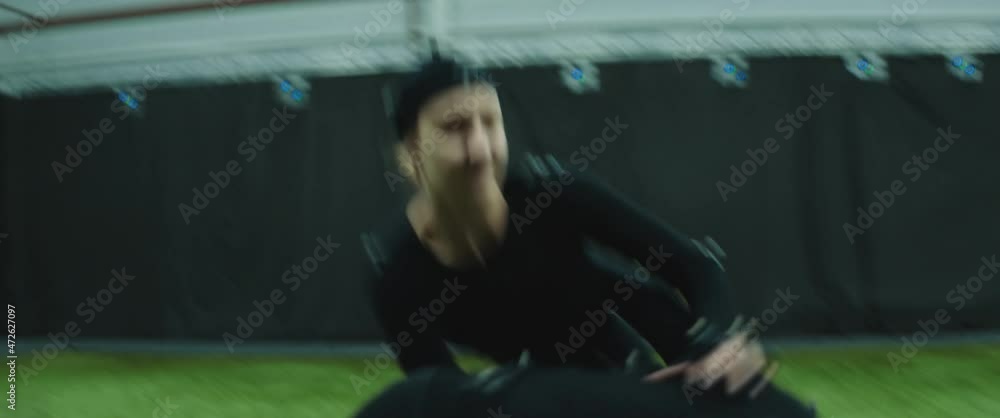 Actors wearing motion capture suits performing some fight moves as game ...