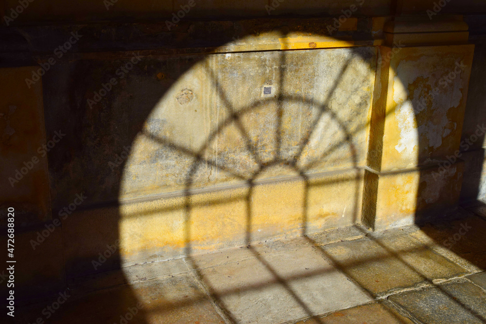 Golden light falling through window of an old church in Clerkenwell ...