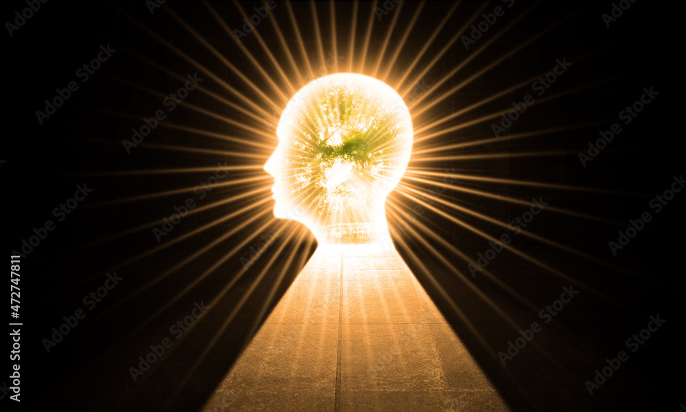 Surreal Light Door made of human head shape in dark concrete room ...