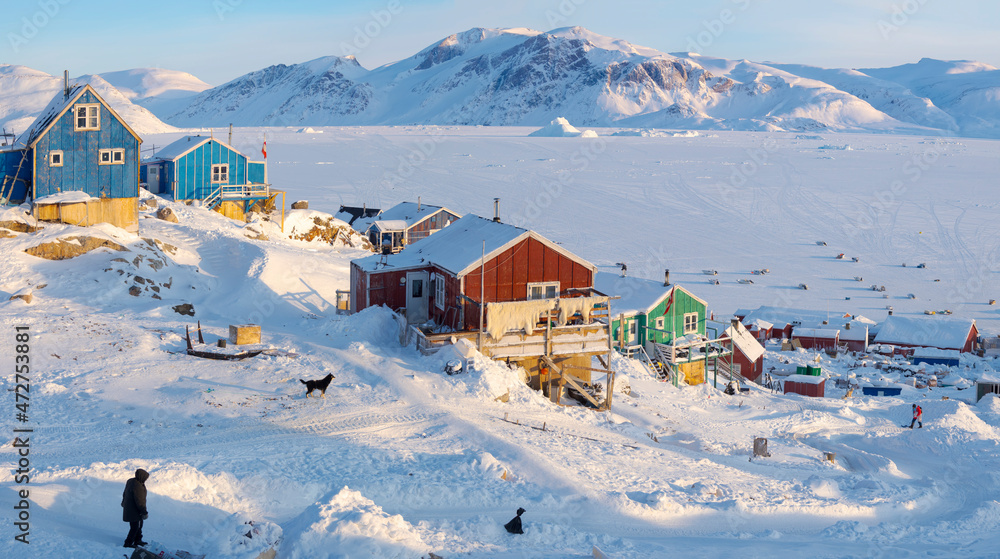 The traditional and remote Greenlandic Inuit village Kullorsuaq located ...
