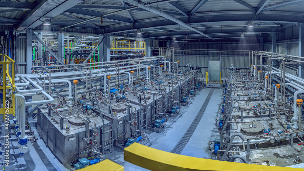 Panorama of additive pumps station with stainless steel tanks and ...