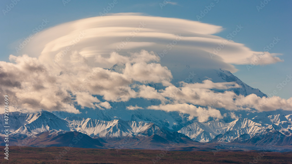USA, Alaska. Fall colors in Denali National Park with a lenticular ...
