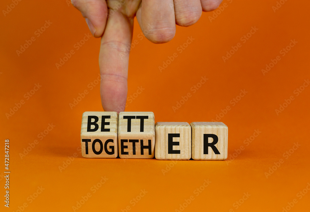 Better together symbol. Businessman turns cubes and changes the word ...