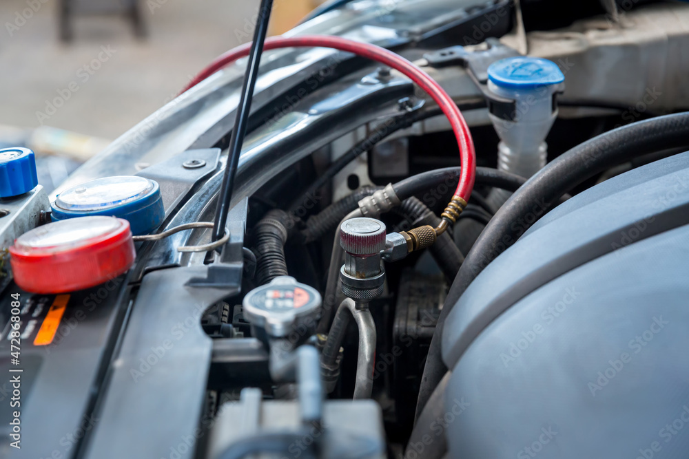 Auto mechanic monitor to check and fixed car air conditioner system in ...