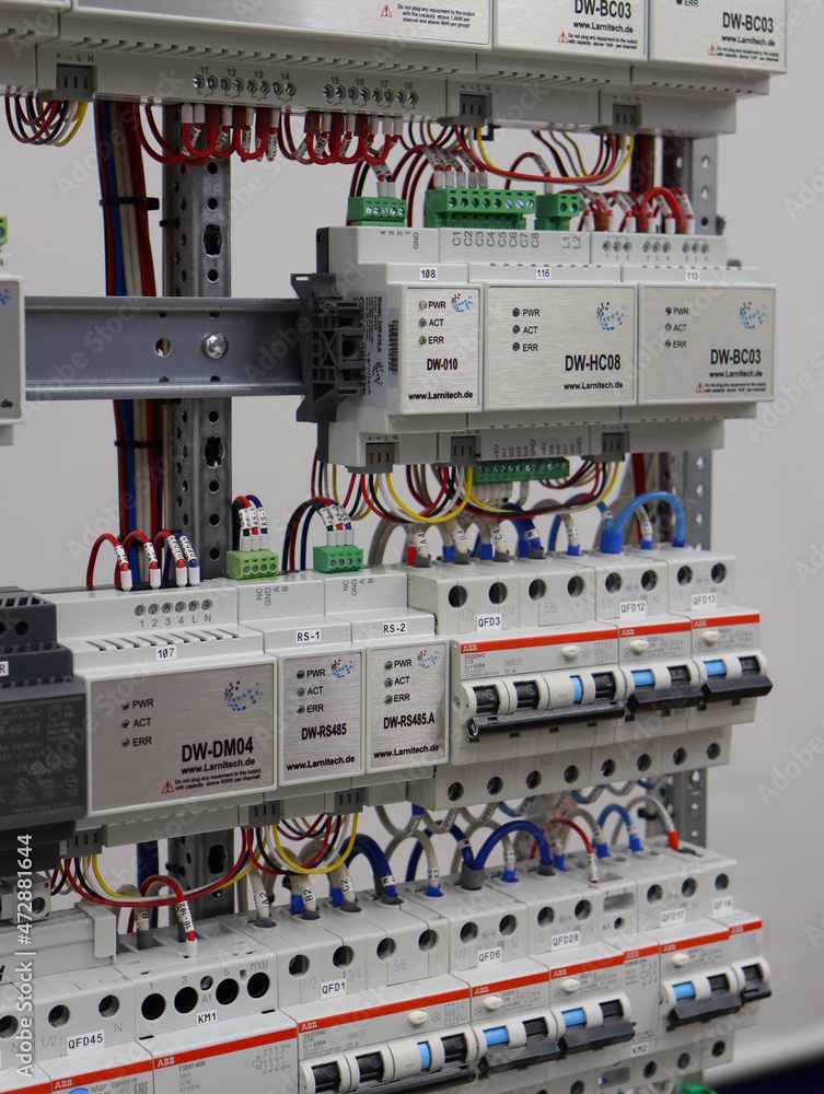 Larnitech automation modules with connected colored mounting wires.3 ...