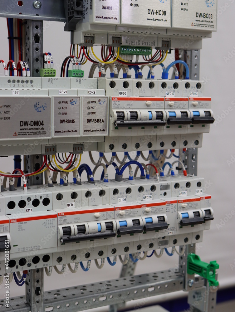 Larnitech automation modules with connected colored mounting wires.3 ...