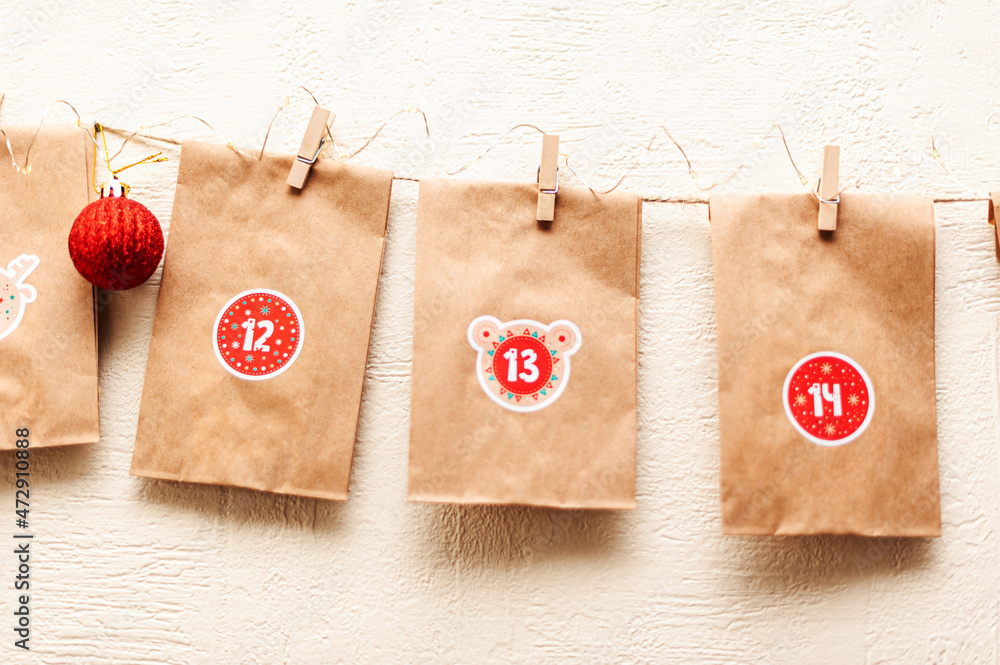 Advent calendar for Christmas hanging homemade from craft paper with ...
