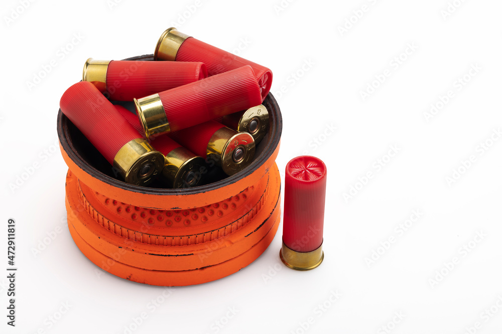 Clay shooting target and shotgun bullets on white background ,Clay ...