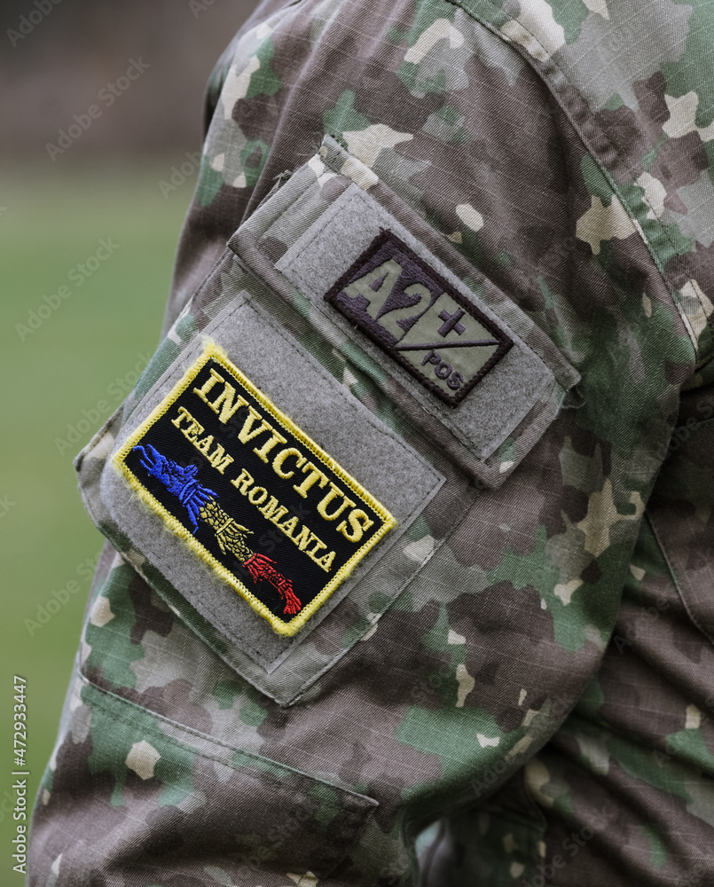 Details with an Invictus Team Romania badge on the uniform of a ...