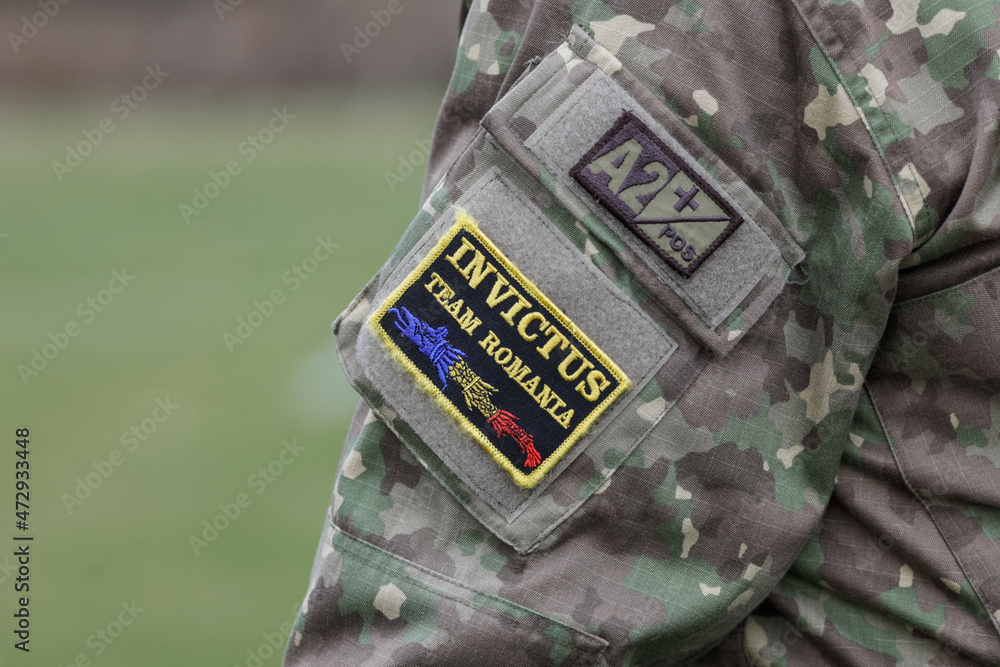 Details with an Invictus Team Romania badge on the uniform of a ...