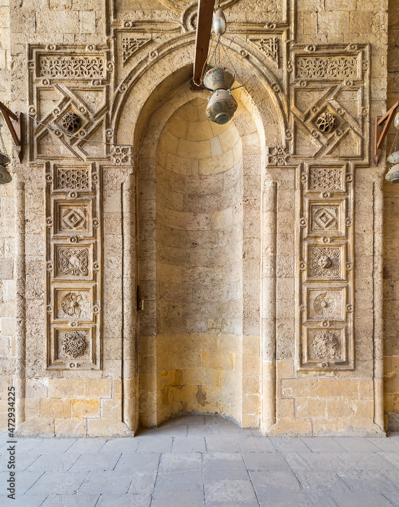 Engraved decorated stone wall with embedded niche in Mamluk era ...