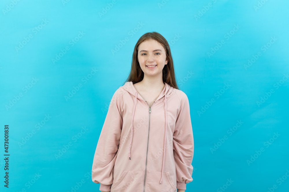 Front view half-body image of a happy young long-haired Caucasian ...