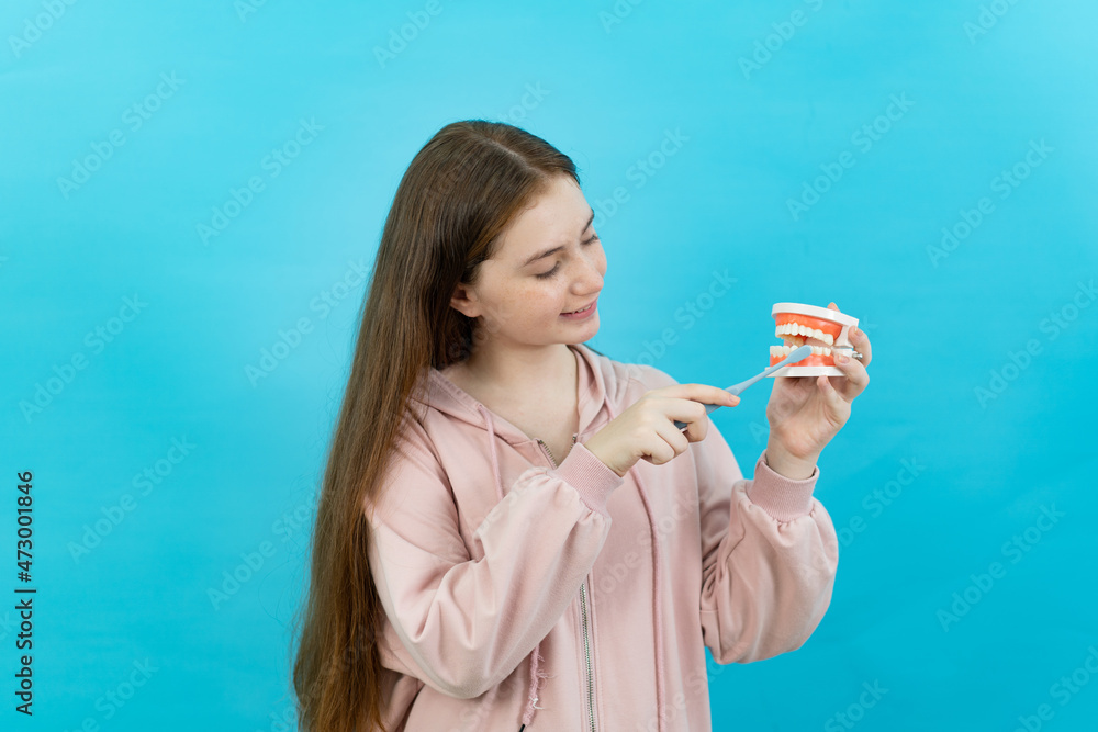 Front view half-body image of a young long-haired Caucasian teenage ...