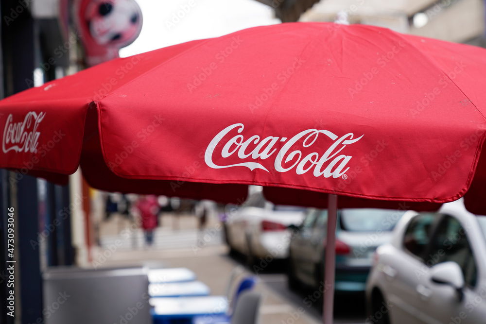 Coca Cola sign logo and brand text on coffee pub terrace cafe of fresh ...