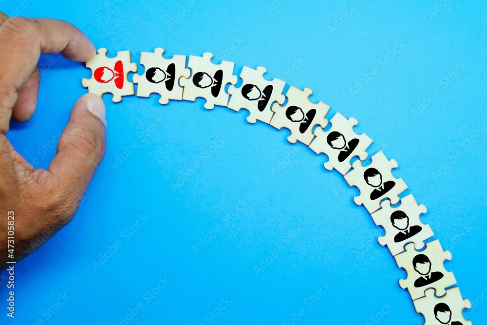 puzzles with candidate icons lined up. employee icon with management ...
