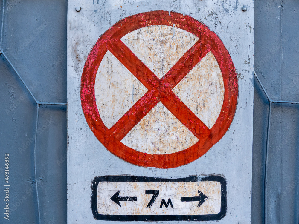 No stopping and parking sign where parking and stopping are prohibited ...