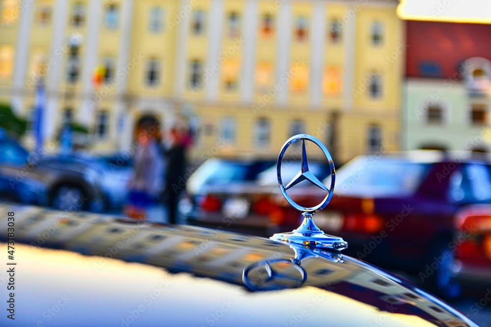 Mercedes Benz logo on a vintage car. Mercedes-Benz is a German ...