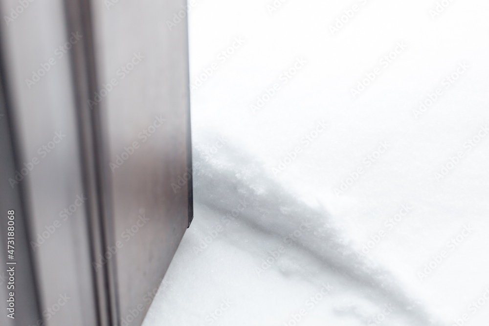 Large layer of snow behind an open door after a heavy snowfall Stock ...